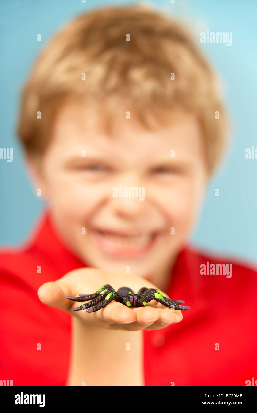 Child holding spider not holloween hi-res stock photography and images ...