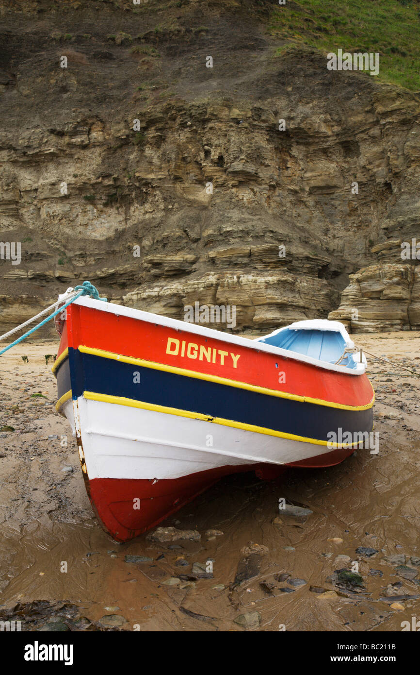 A picturesque boat, "Dignity" in Staithes harbour, North Yorkshire ...