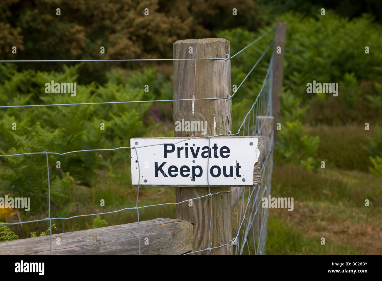 Private Keep Out sign on fence post Stock Photo - Alamy