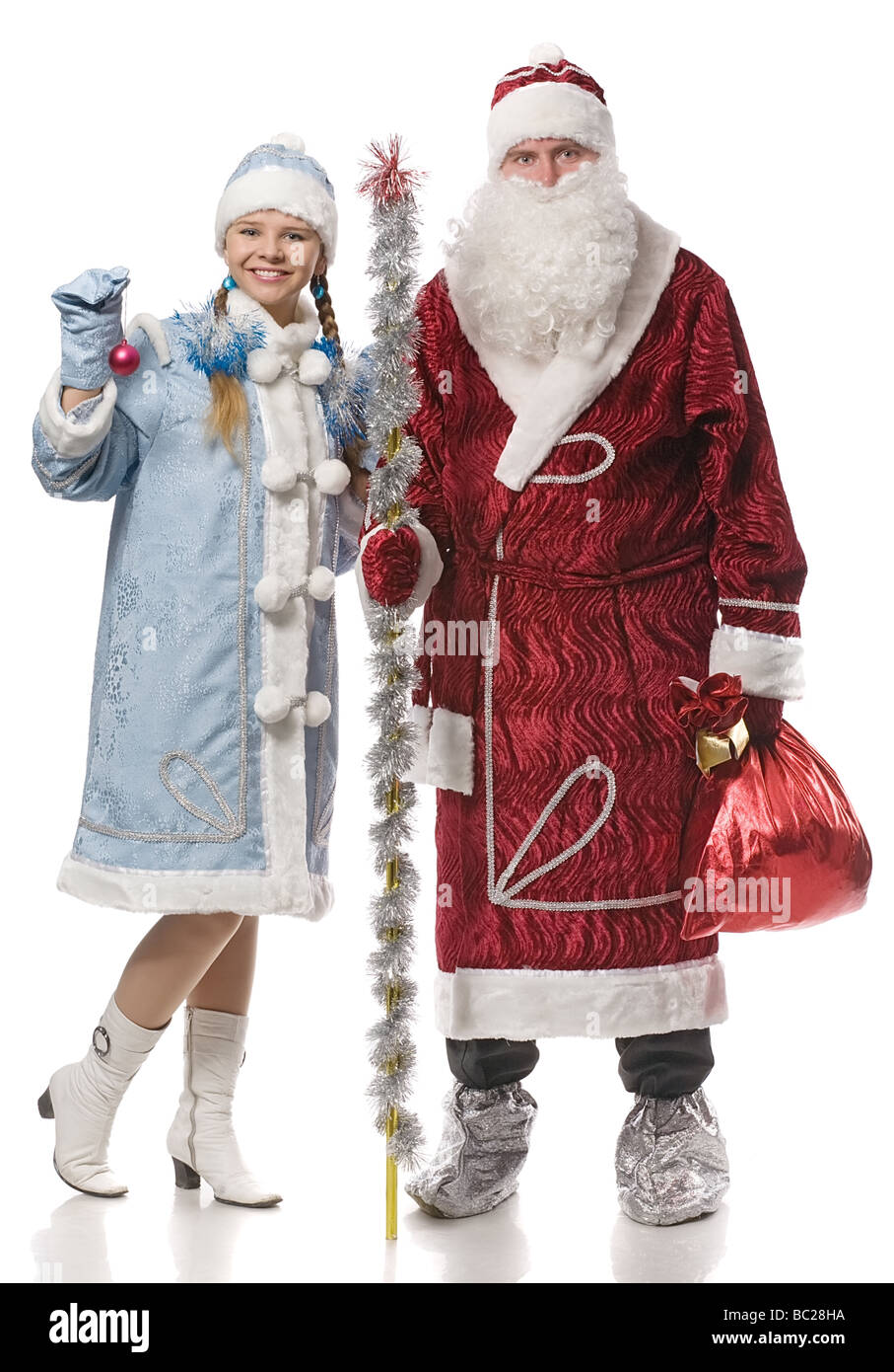 Santa Claus and snow girl isolated on white Stock Photo - Alamy