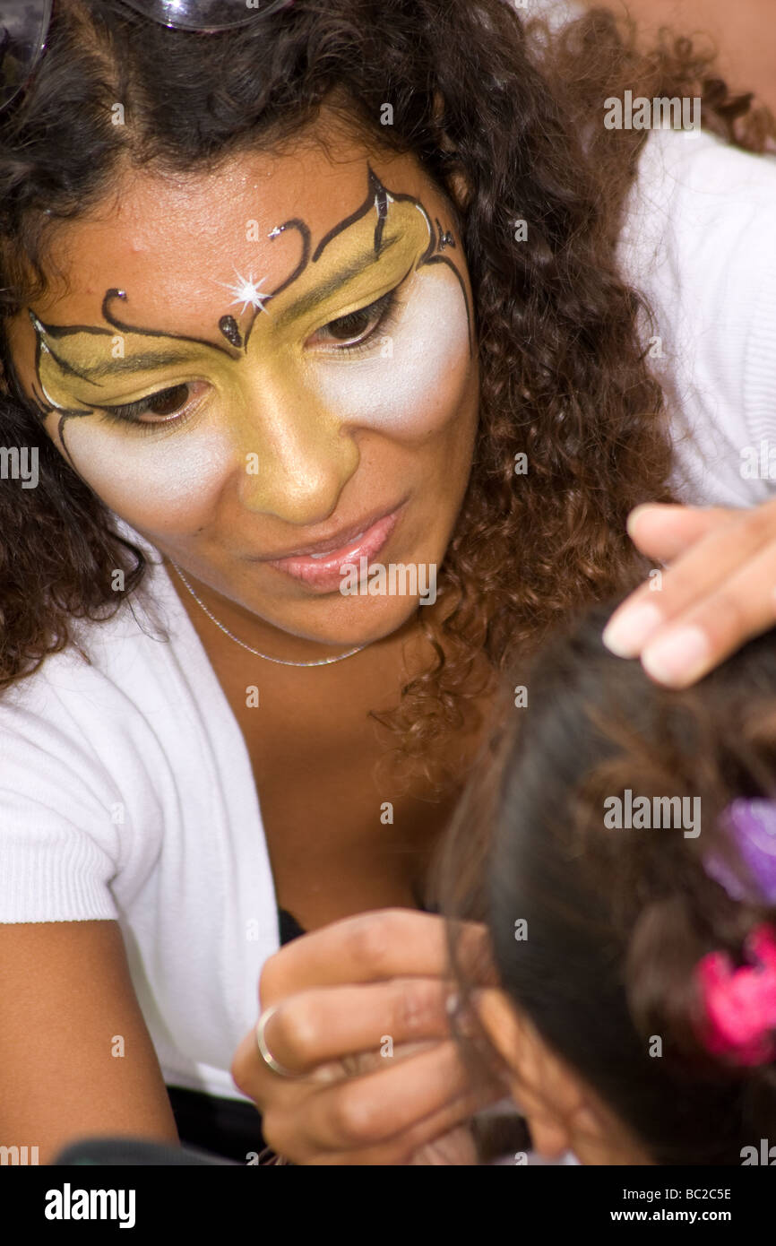woman face painter boy latin american painting tottenham festival bruce ...