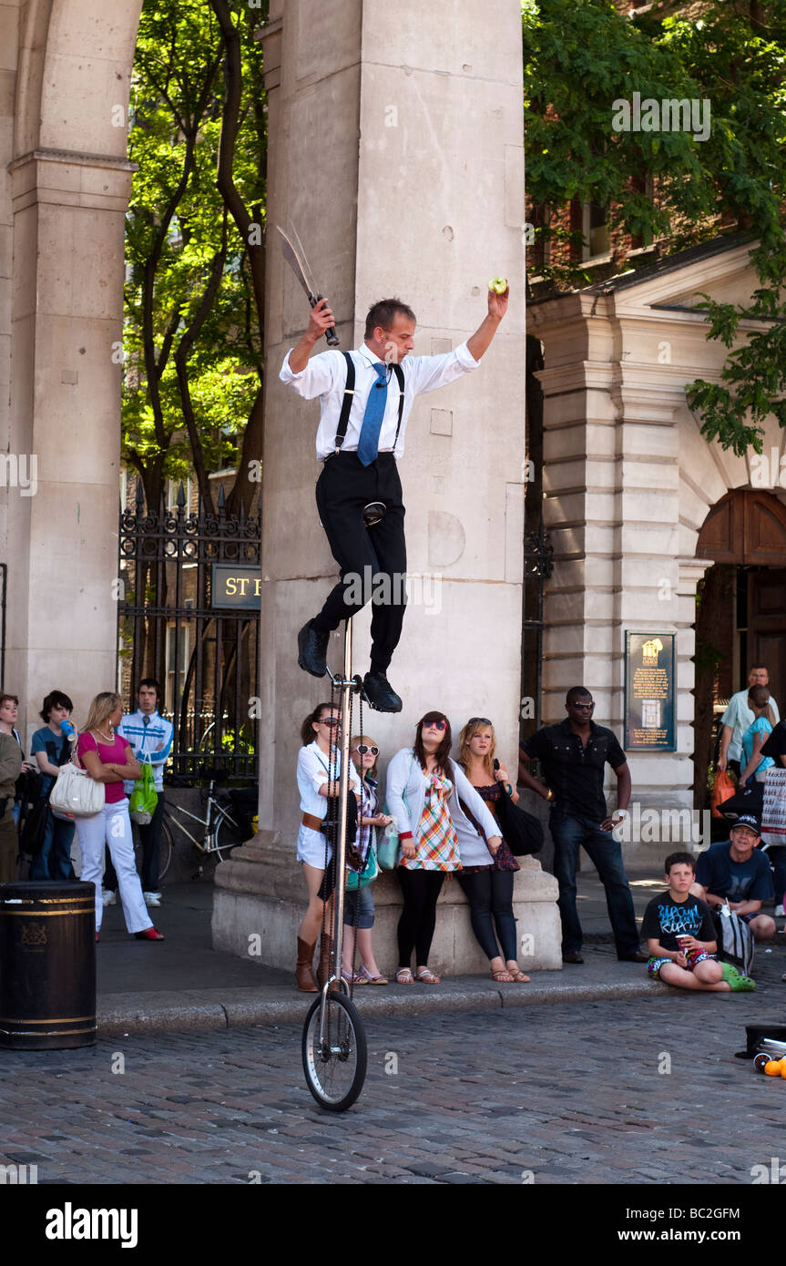 Juggling on a unicycle hi-res stock photography and images - Alamy