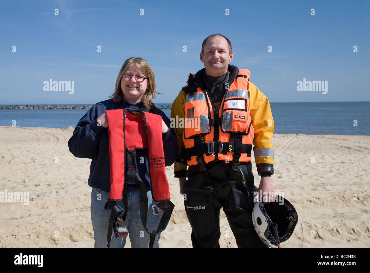 Lifeboat crew members Lesley and Eddie Bellerby display old (left) and ...