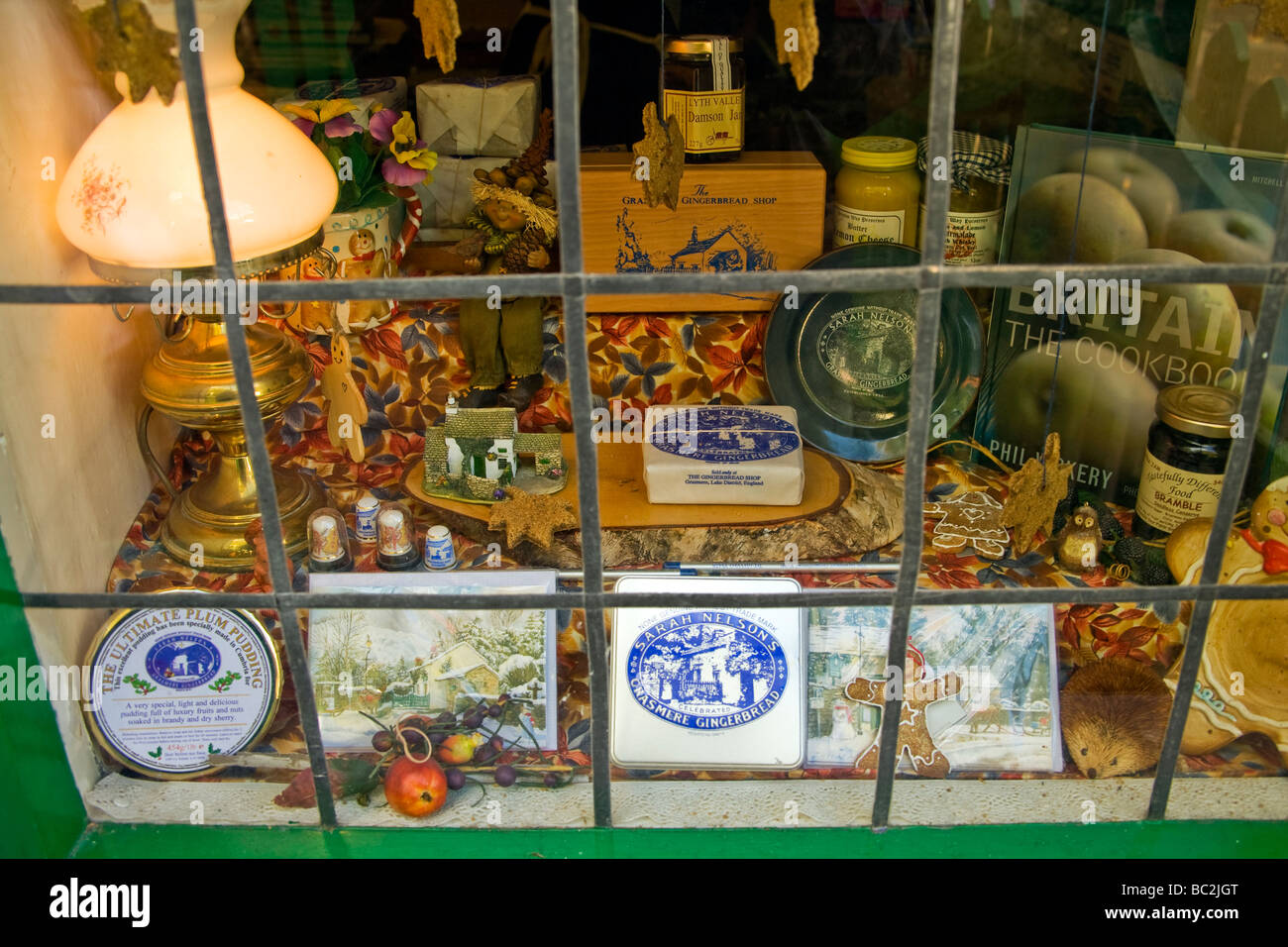 Variety of British souvenirs fill a gift shop window in Grasmere in ...