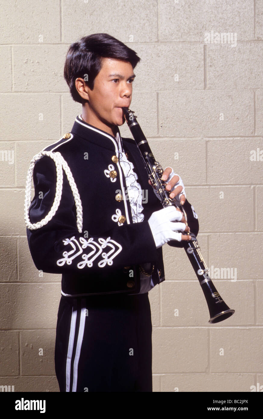 teen band instrument clarinet music play woodwind uniform asian ethnic ...