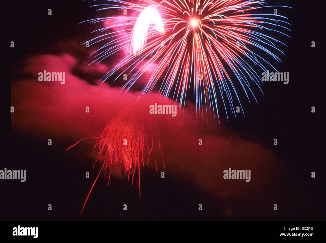 fireworks sky explode color spread flame spark rocket aerial Stock ...