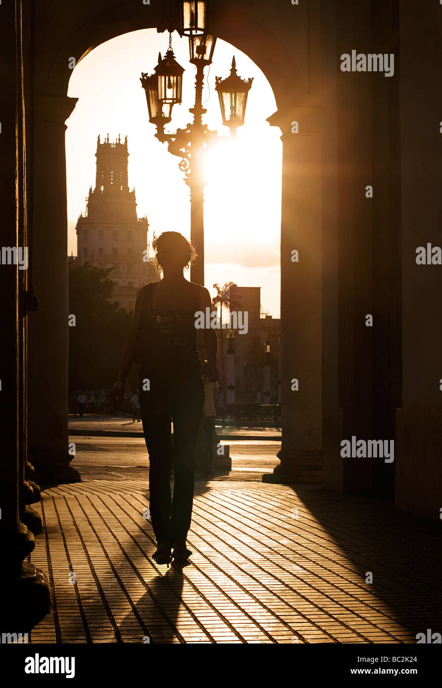 Silhouette of Cuban woman walking. Plaza Central, Havana, Cuba Stock ...