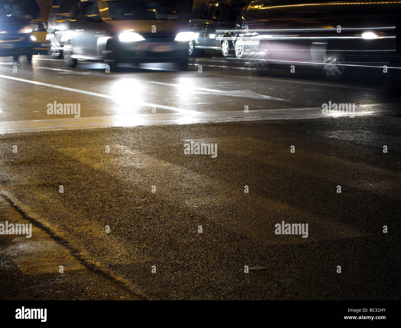 fast cars in dark street at night Stock Photo - Alamy
