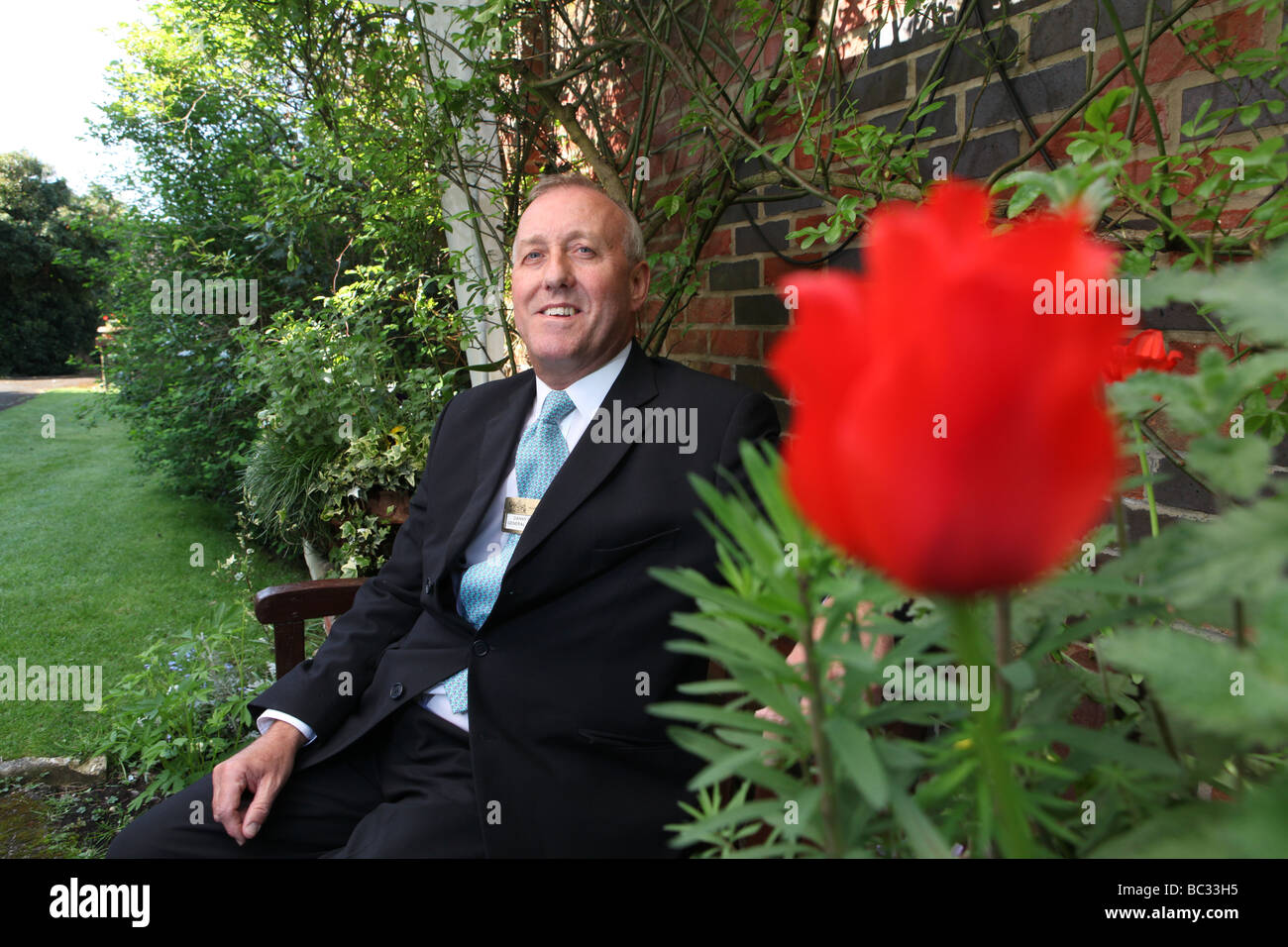 Butler in garden hi-res stock photography and images - Alamy
