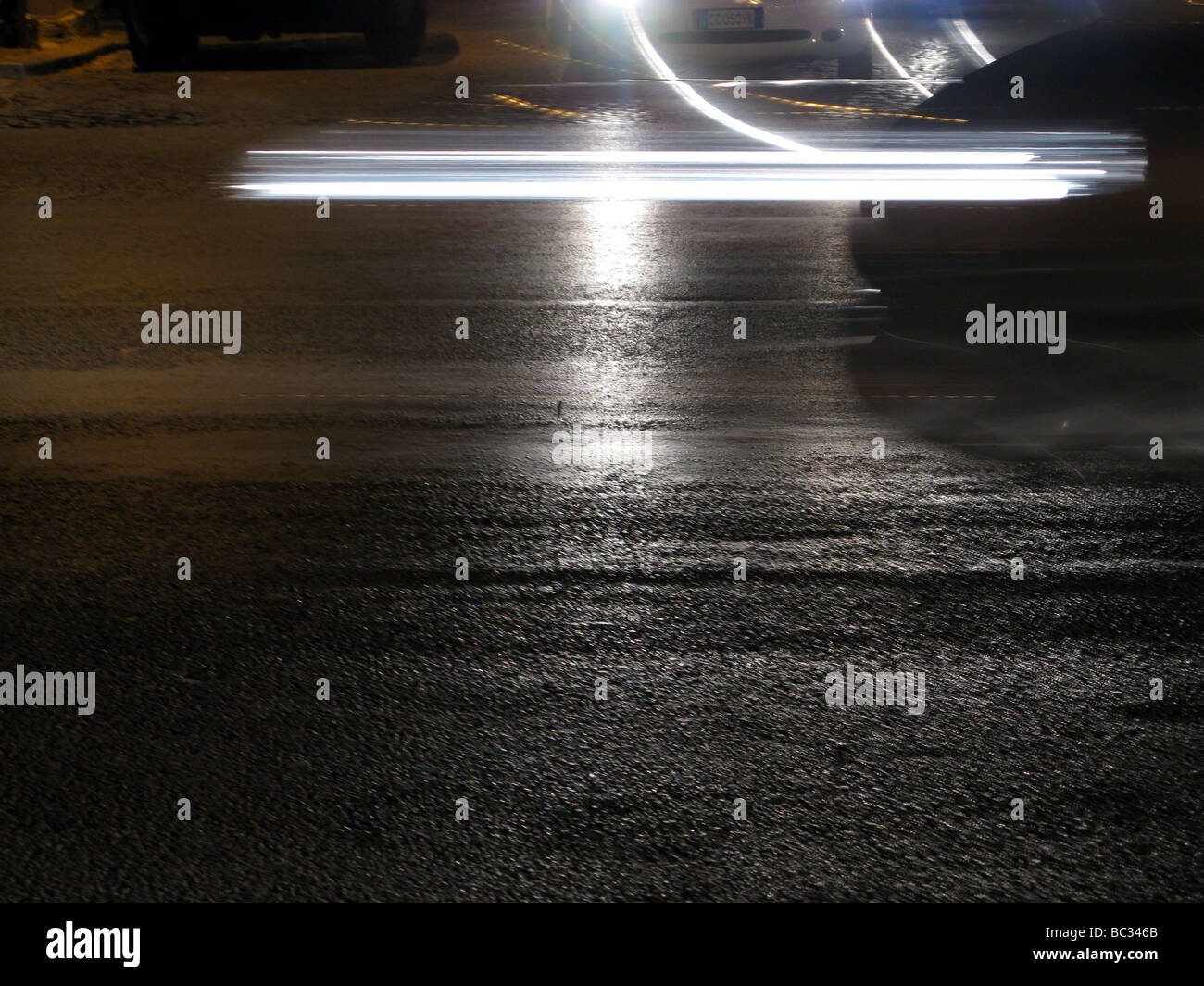 fast cars in dark street at night Stock Photo - Alamy