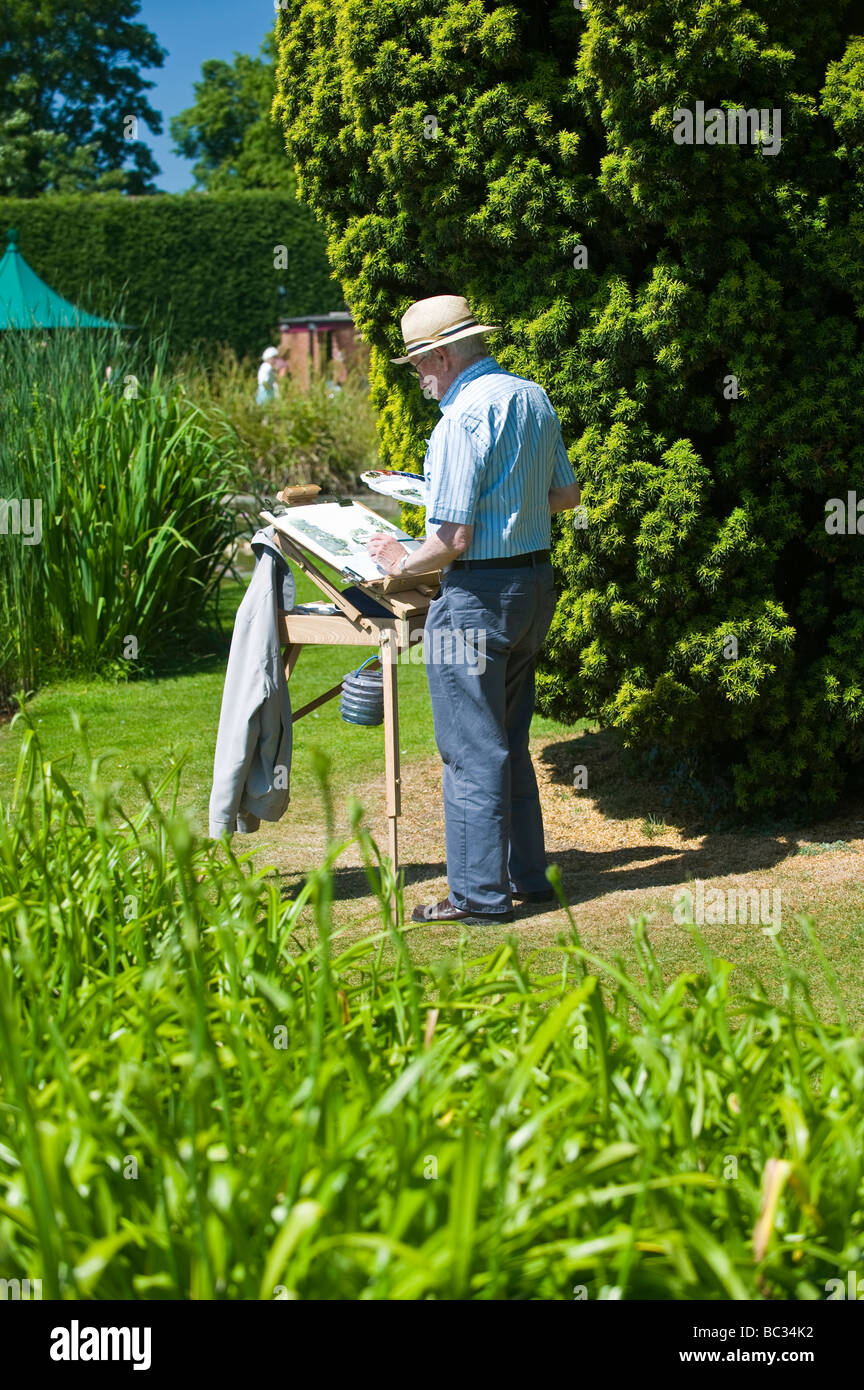 Artist at work in the summer sunshine Stock Photo - Alamy