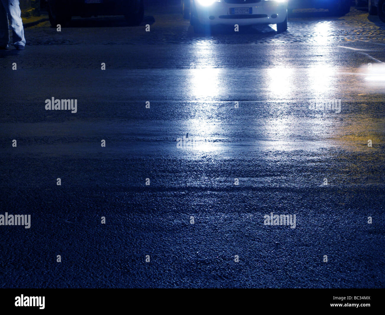 fast cars in dark street at night Stock Photo - Alamy