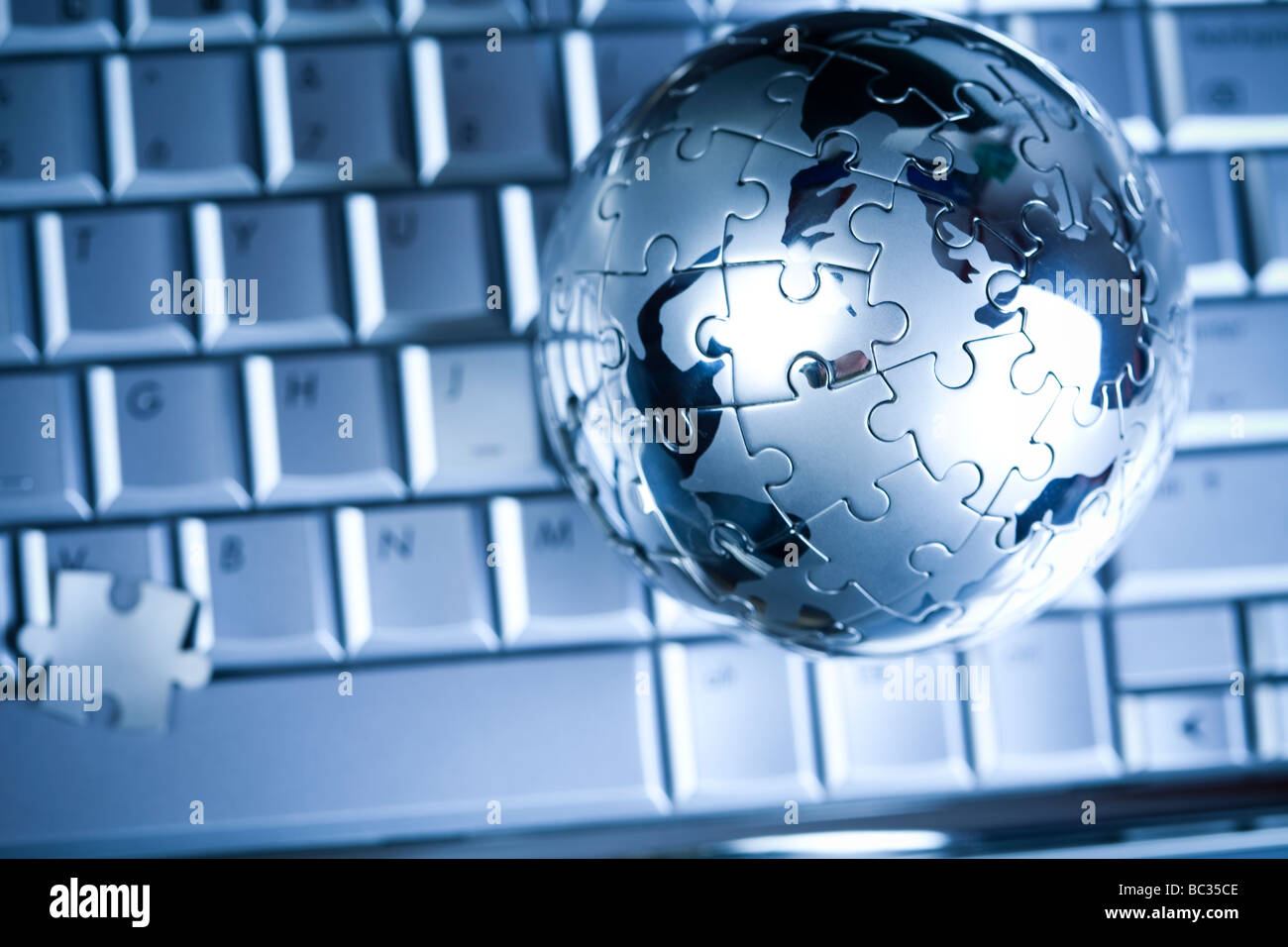 Globe made from jigsaw & Notebook Stock Photo - Alamy