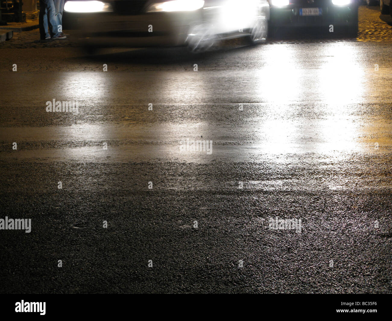 fast cars in dark street at night Stock Photo - Alamy
