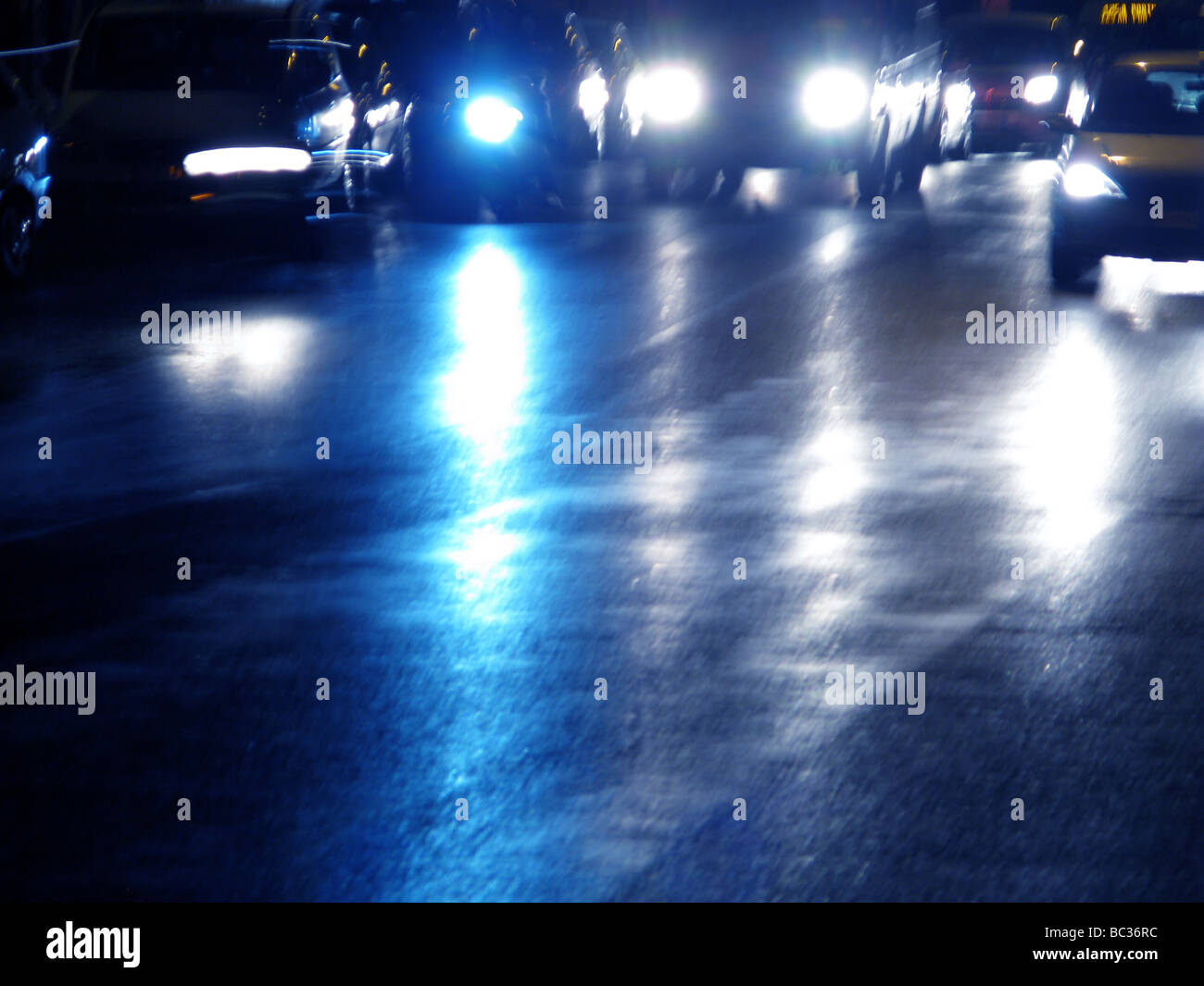 fast cars in dark street at night Stock Photo - Alamy