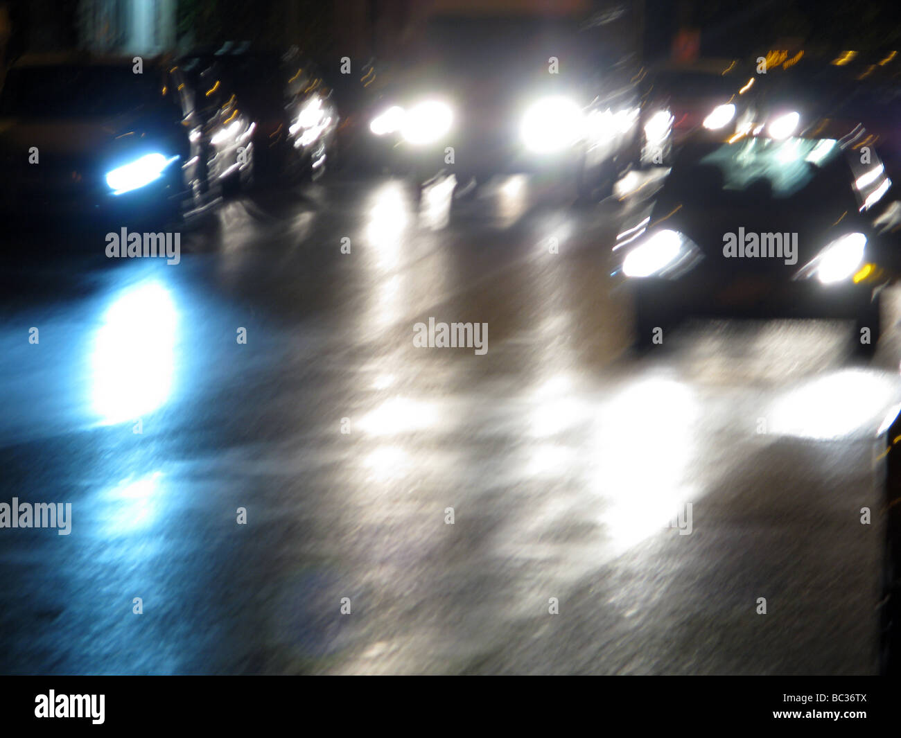 fast cars in dark street at night Stock Photo - Alamy