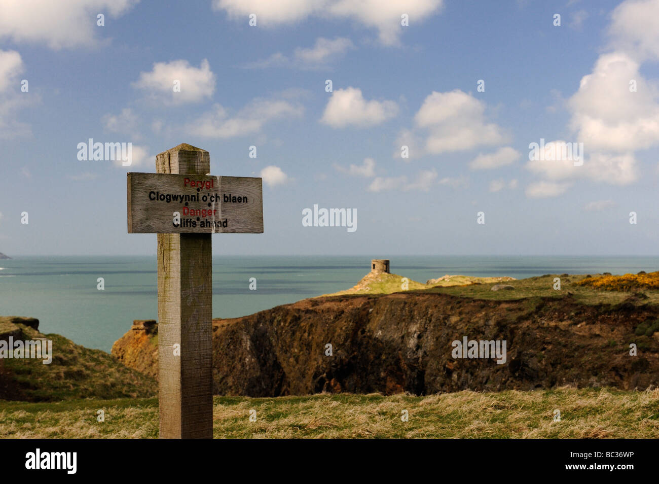 Cliff warning signs near the quarry at Abereiddy on the Pembrokeshire ...