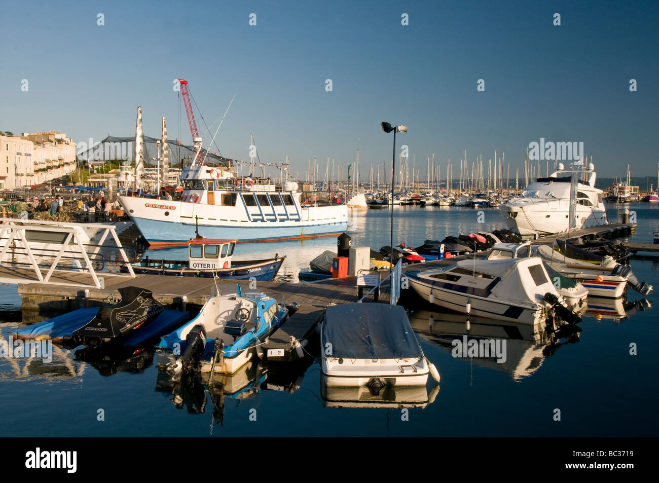 Torquay Harbour and Marina showing the Torbay Ferry Boat Stock Photo ...
