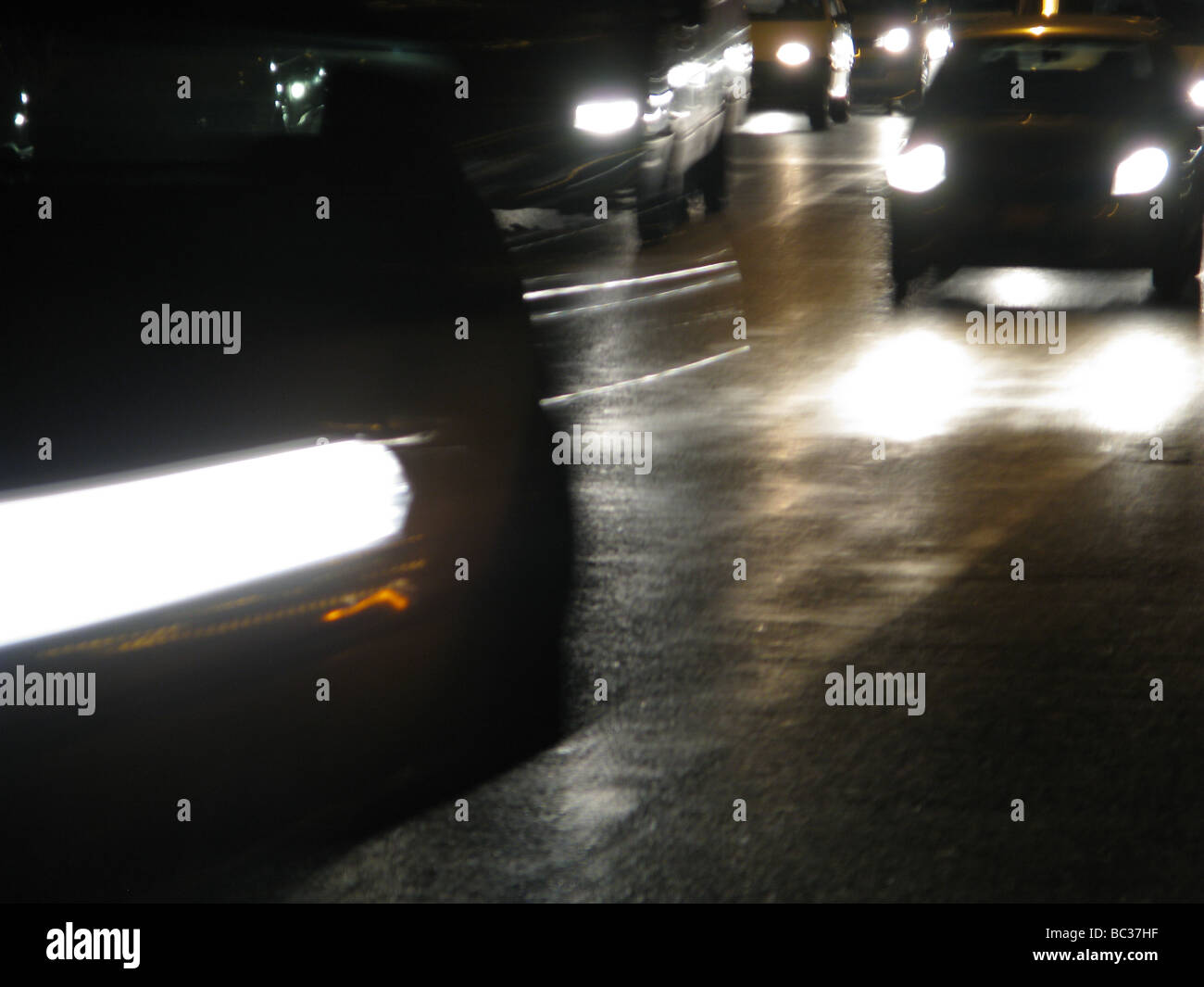 fast cars in dark street at night Stock Photo - Alamy