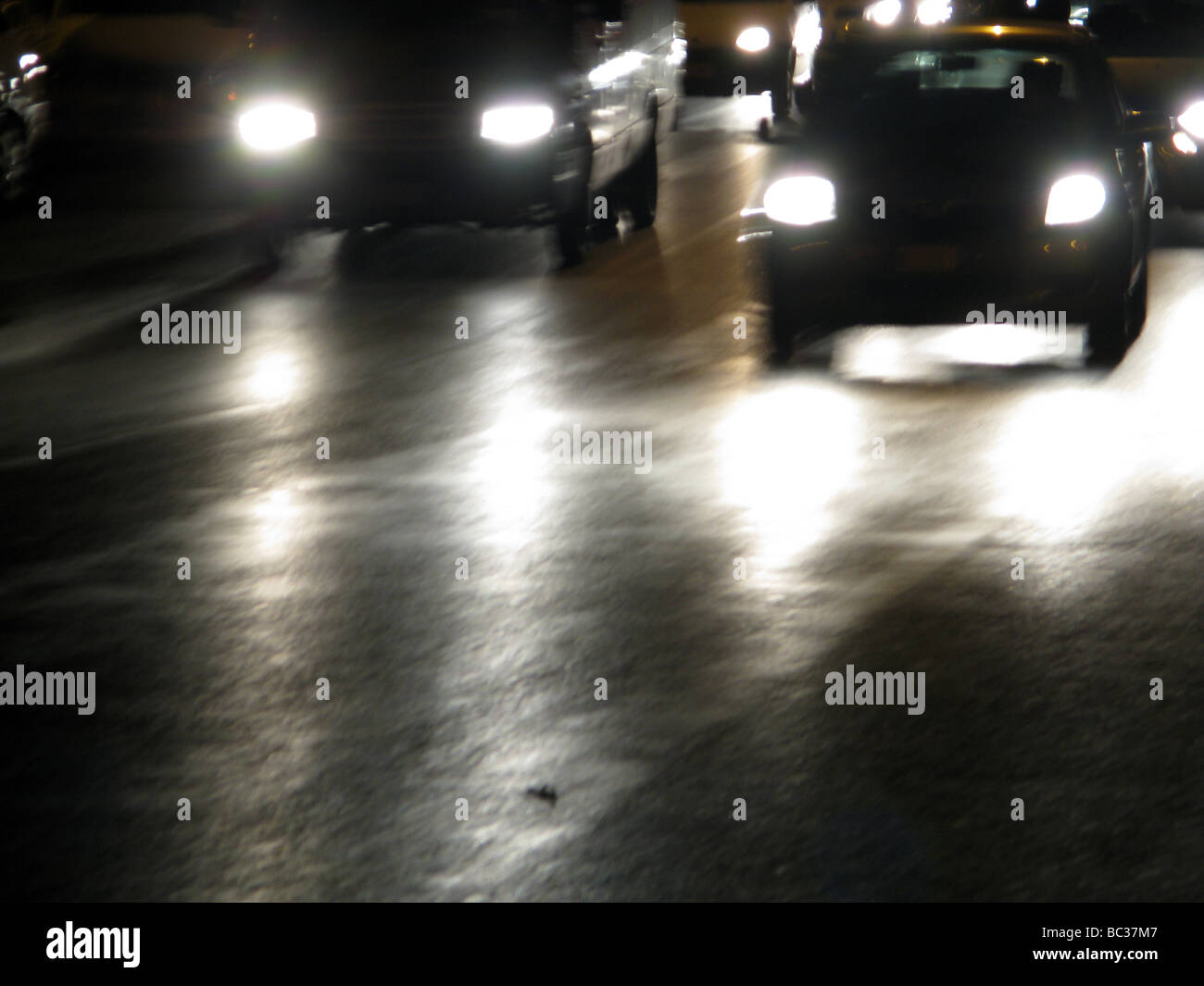 fast cars in dark street at night Stock Photo - Alamy