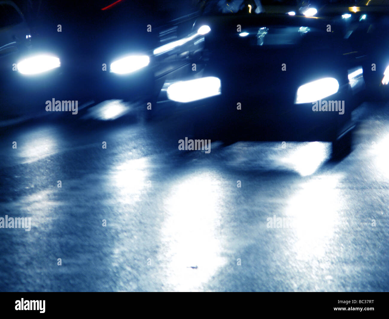 fast cars in dark street at night Stock Photo - Alamy