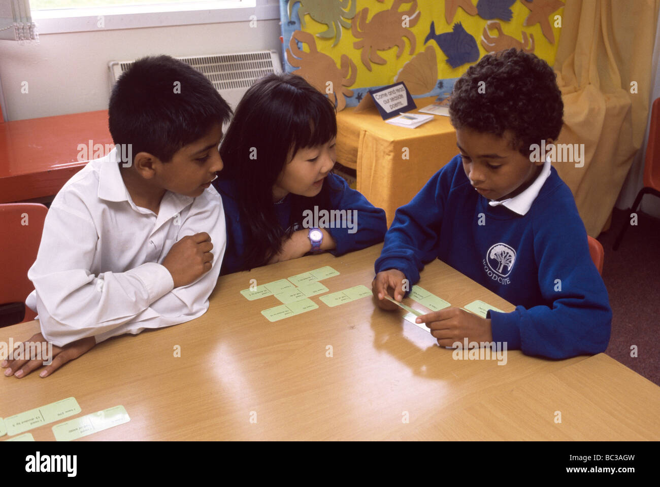 primary school children learning to solve mathematical problems Stock ...