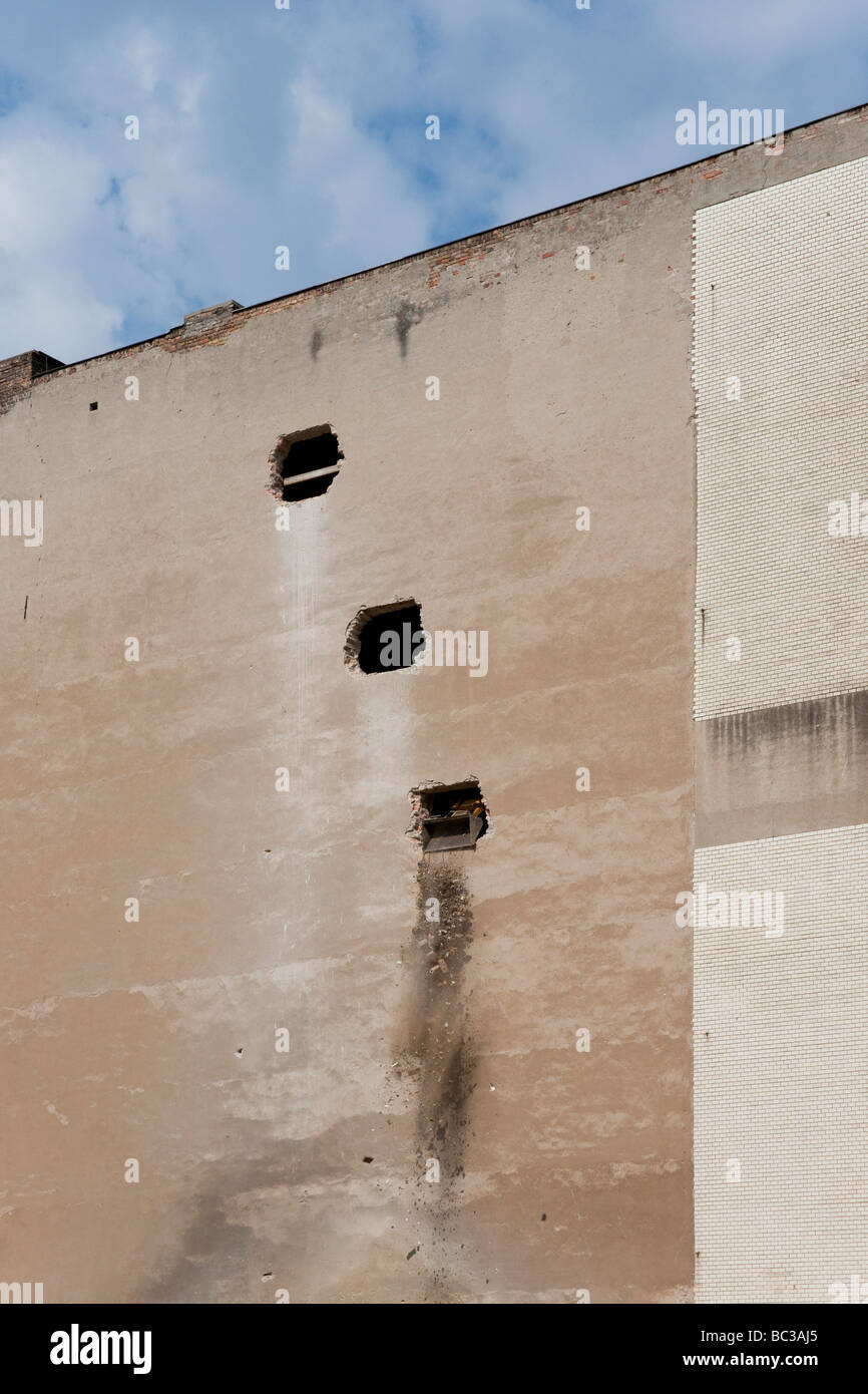 housewall with holes constructionside Stock Photo - Alamy