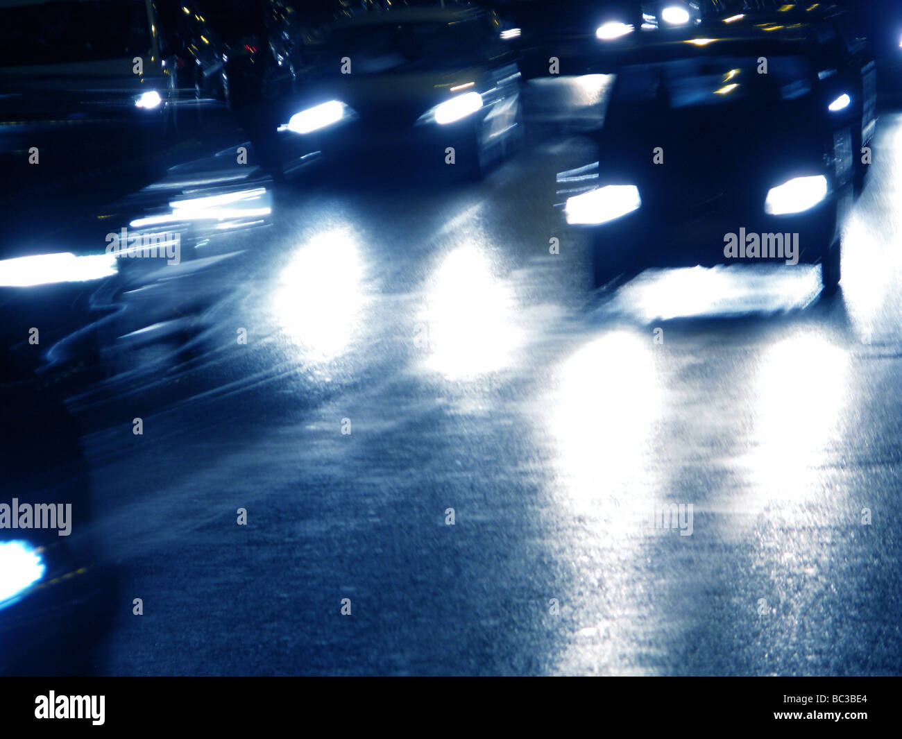 fast cars in dark street at night Stock Photo - Alamy