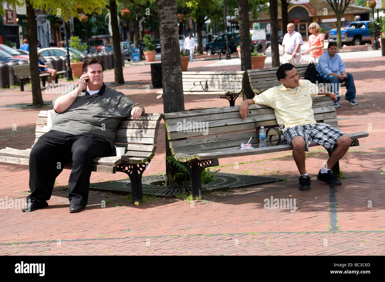 Men relaxing in Baltimore park Stock Photo - Alamy