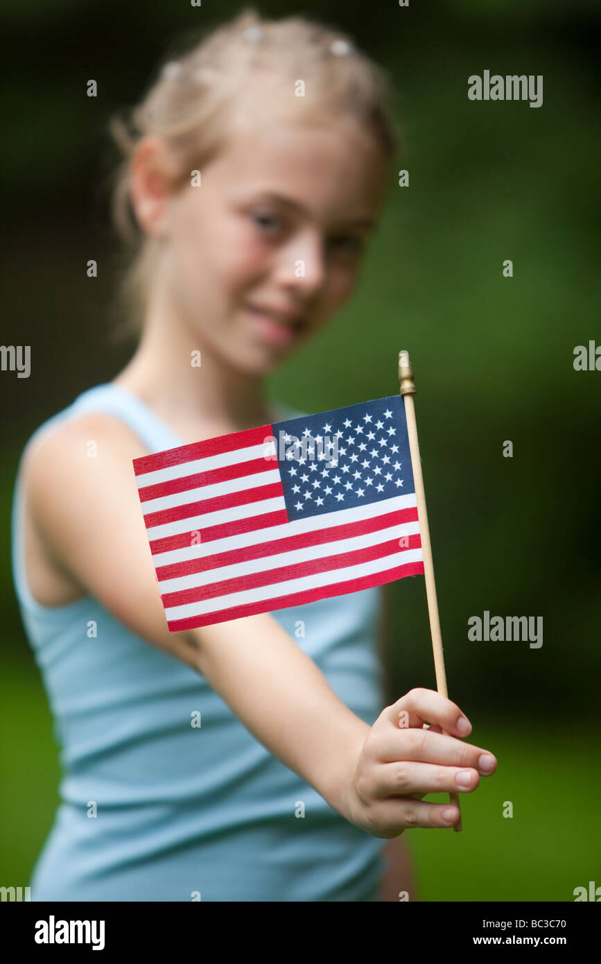 Child holding an American flag Stock Photo - Alamy