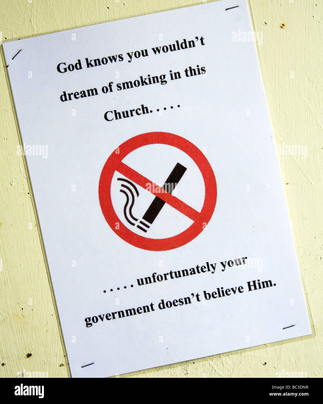 Amusing No Smoking Sign in the Entrance to a Church Stock Photo - Alamy