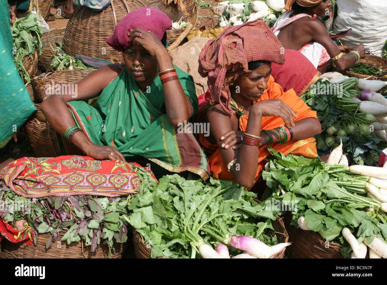 Indian Paroja Tribe Women Selling Parsnips On Their Market Stall Stock ...