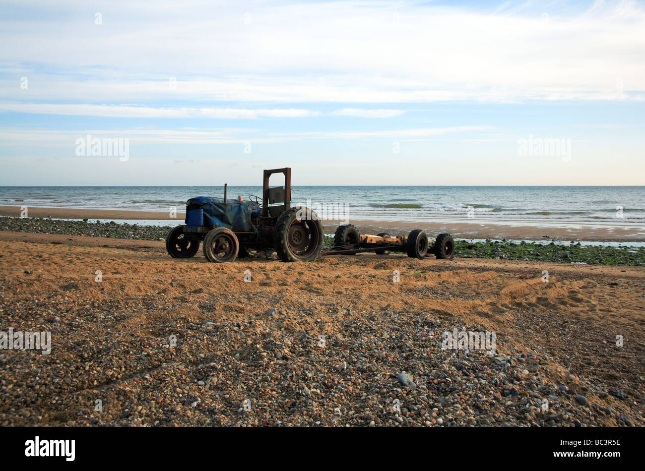 Tractor and trailer on the beach at Overstrand, Norfolk, United Kingdom ...