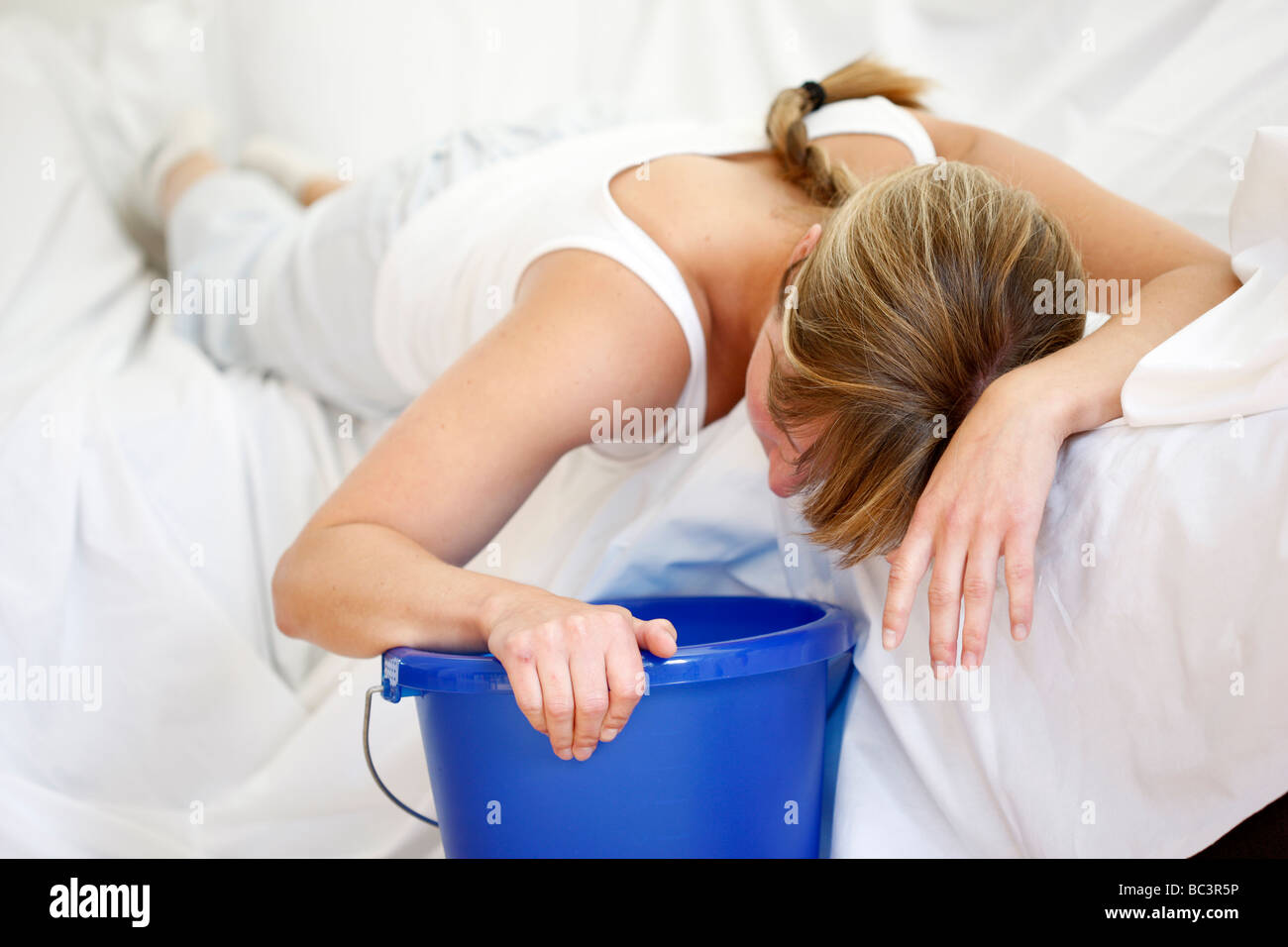 Woman is vomiting sickness Stock Photo - Alamy