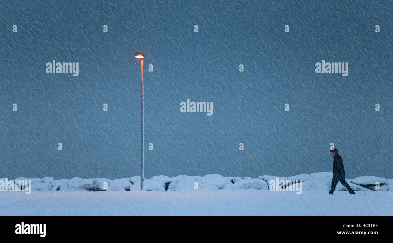 Man walking street snow storm hi-res stock photography and images - Alamy