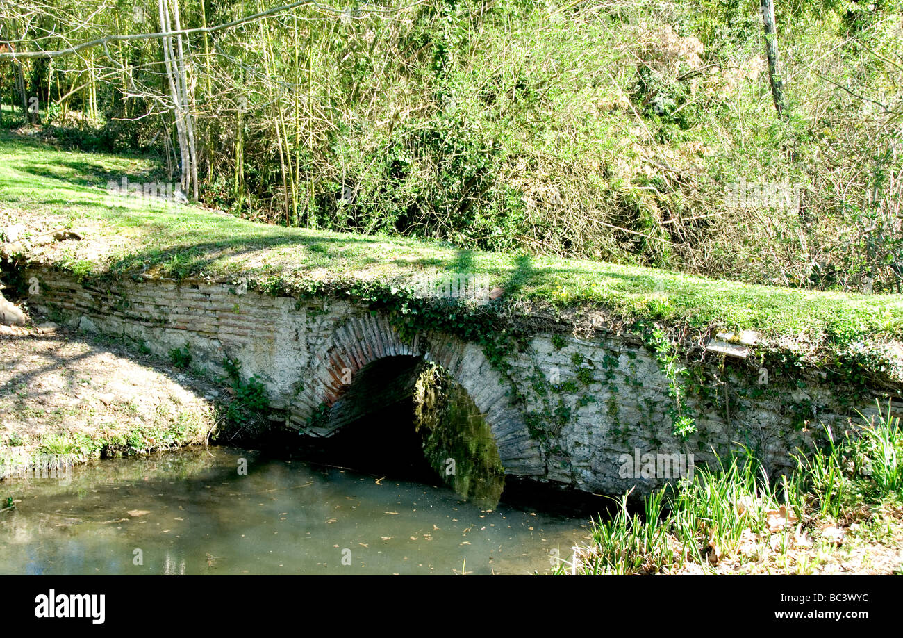 Old footbridge over river Stock Photo - Alamy