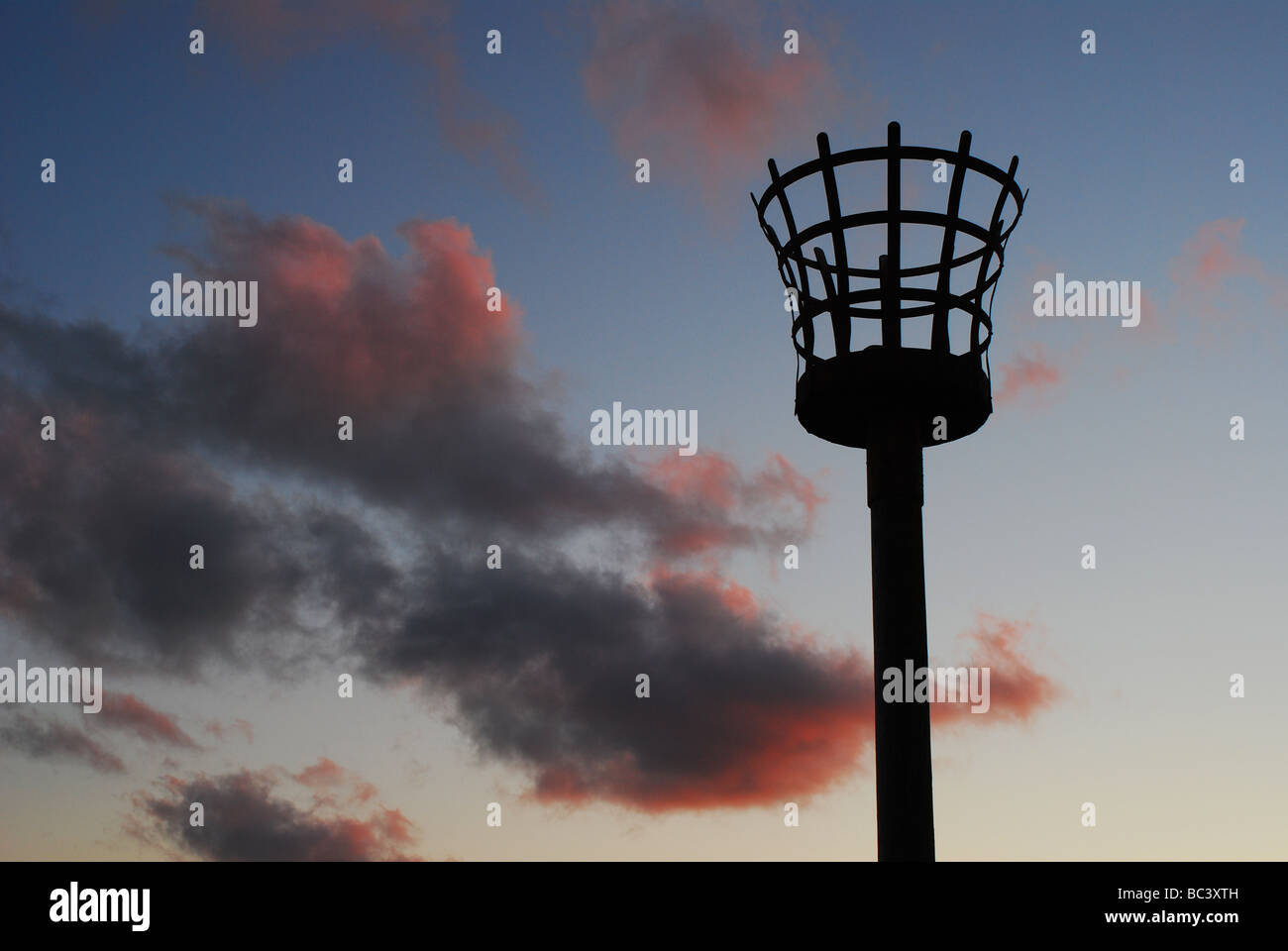 Beacon against sunset sky Stock Photo - Alamy