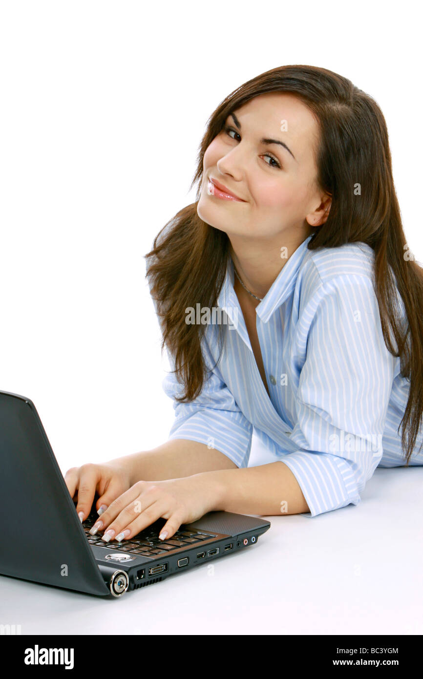 Junge Frau mit Laptop Young Woman on her Laptop Computer Stock Photo ...
