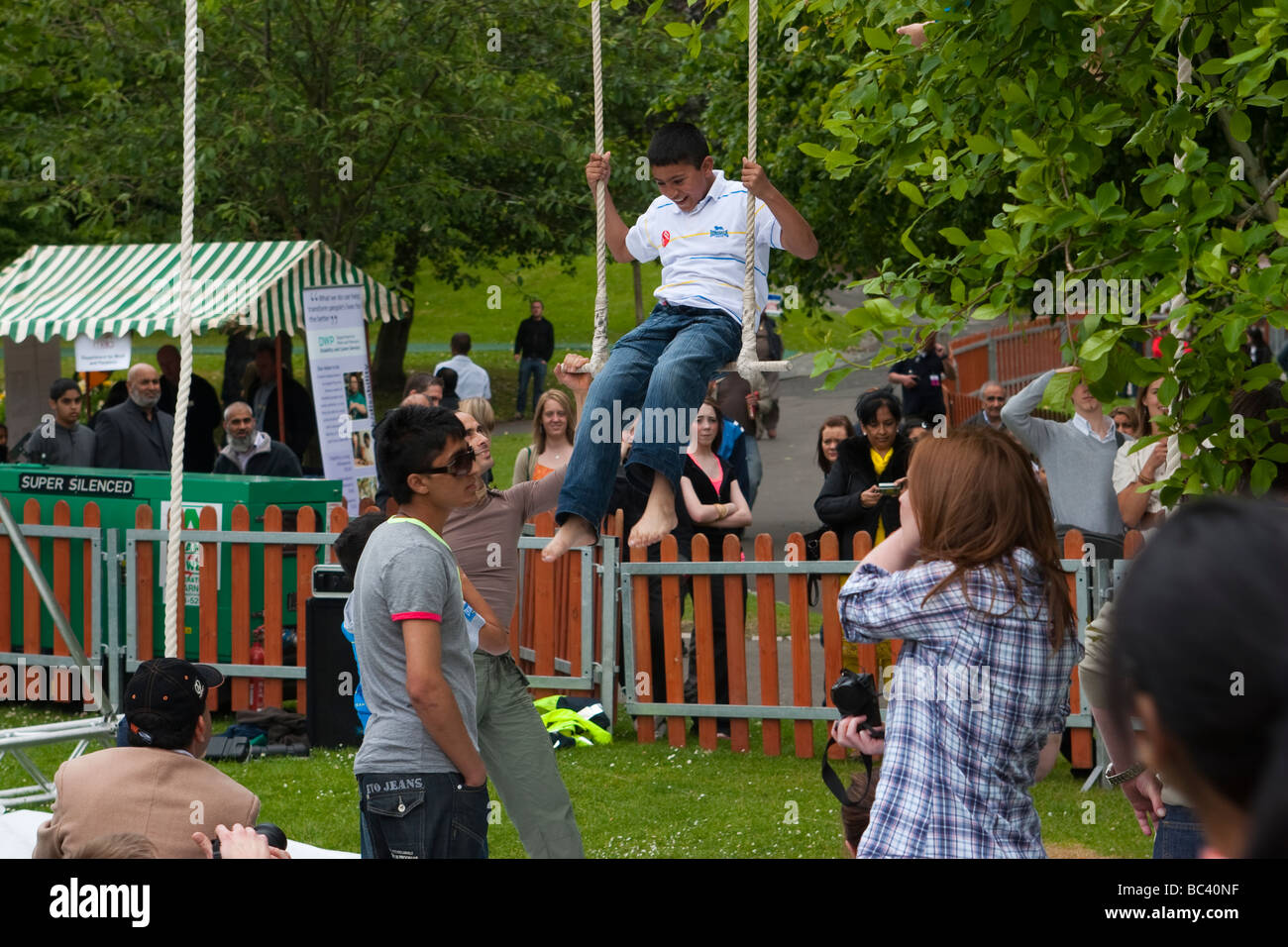 Trapeze lessons in park Stock Photo - Alamy
