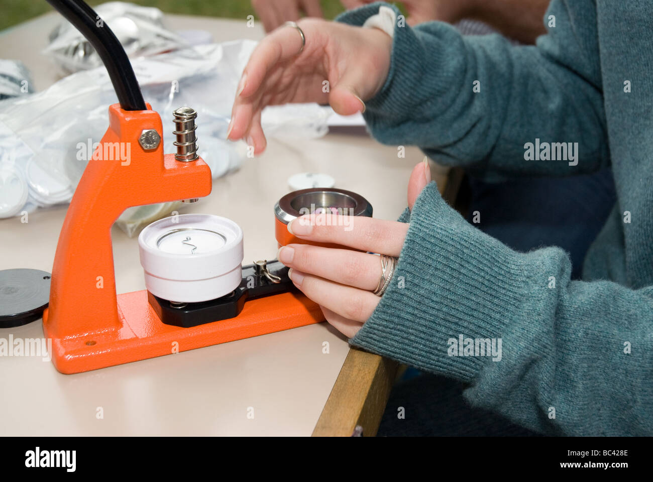 Badge machine hi-res stock photography and images - Alamy