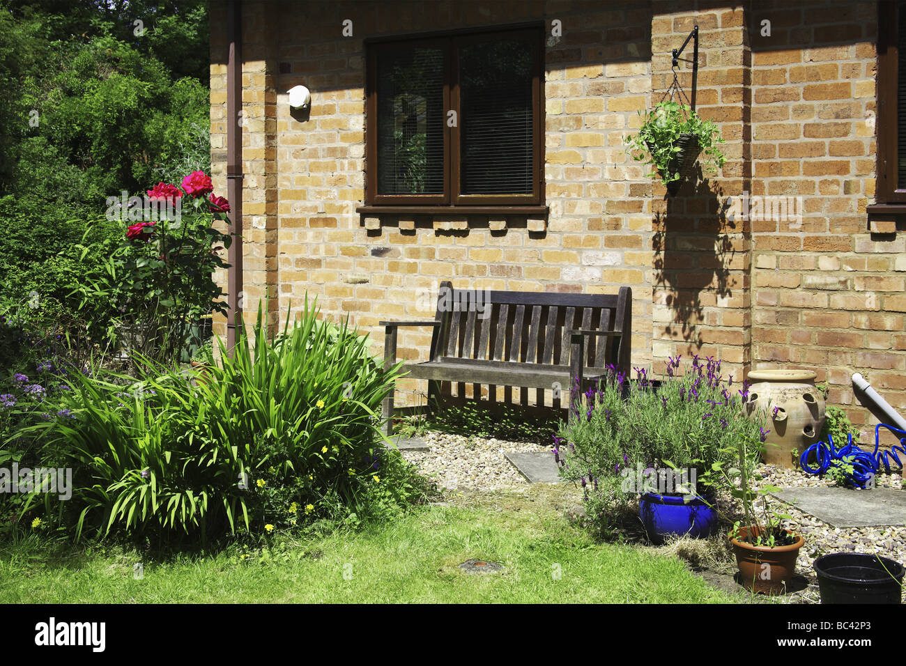 a cottage with a back garden Stock Photo - Alamy