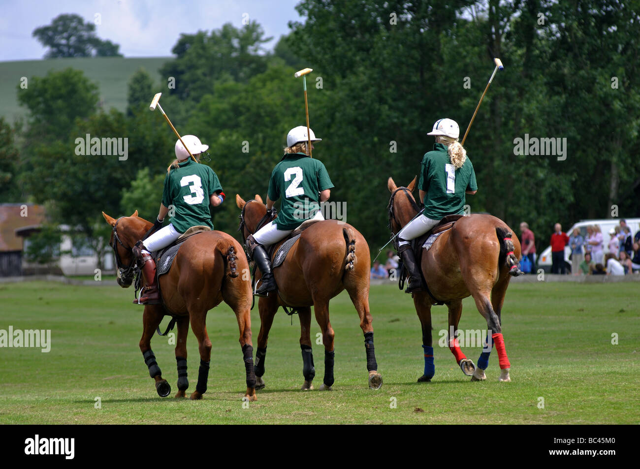Three polo players, UK Stock Photo - Alamy