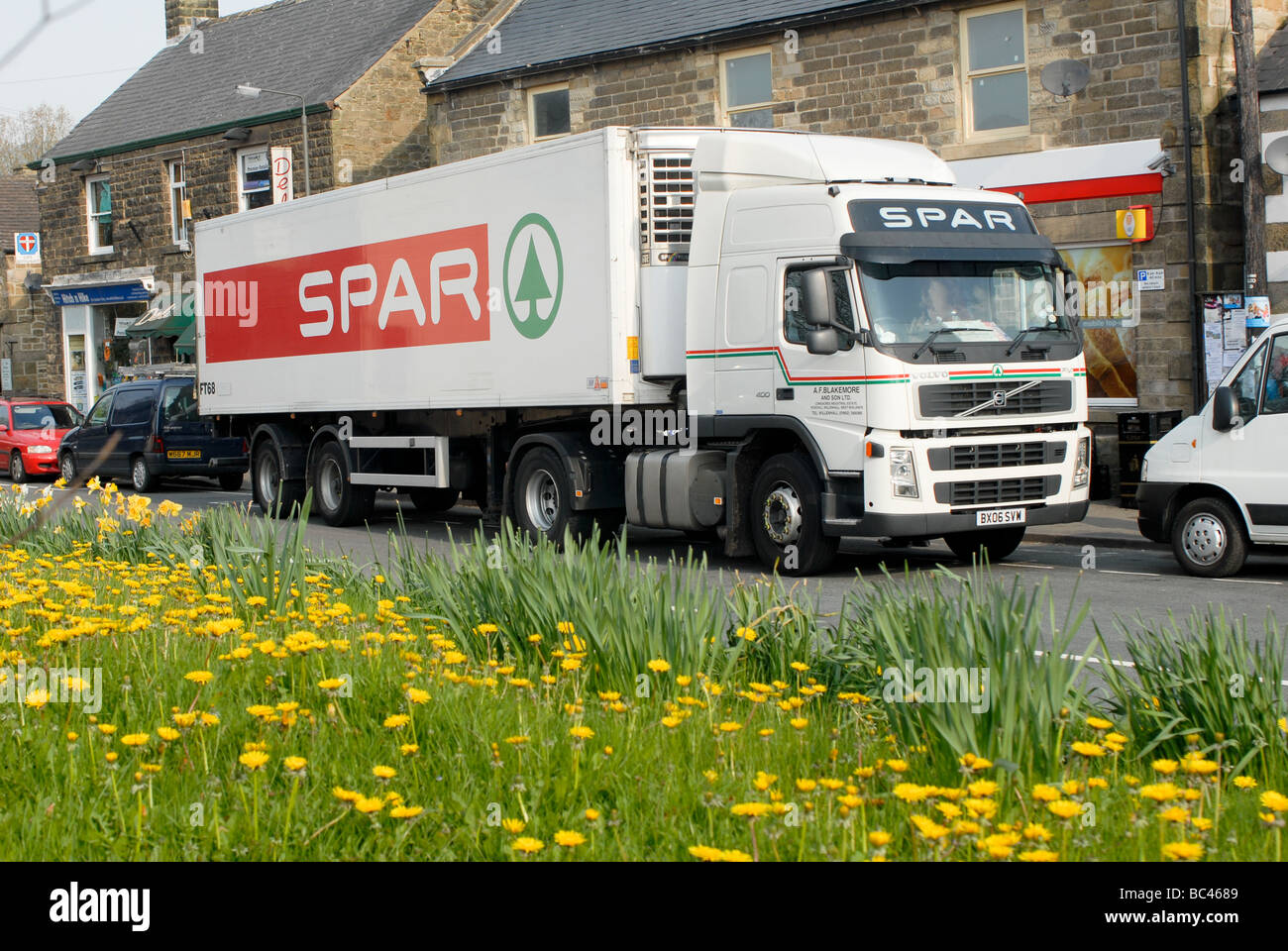 Refrigerated lorry delivering to rural Spar shop in Hope, Derbyshire ...