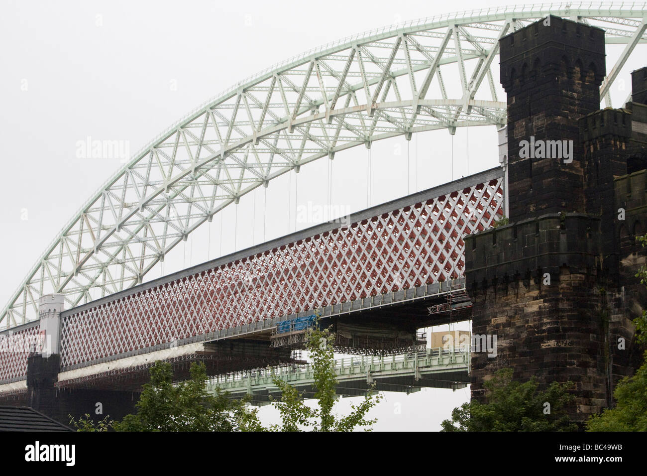 Refurbishment of The Runcorn Railway Bridge crosses the River Mersey at ...