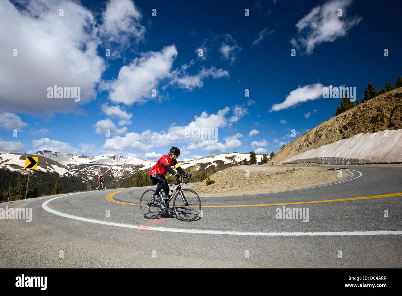Cyclists riding up Independence Pass in Colorado during the annual Ride ...