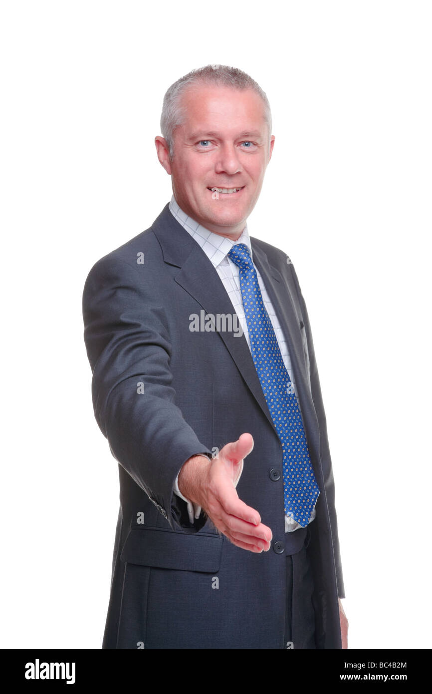 A mature businessman offering to shake your hand isolated on a white ...