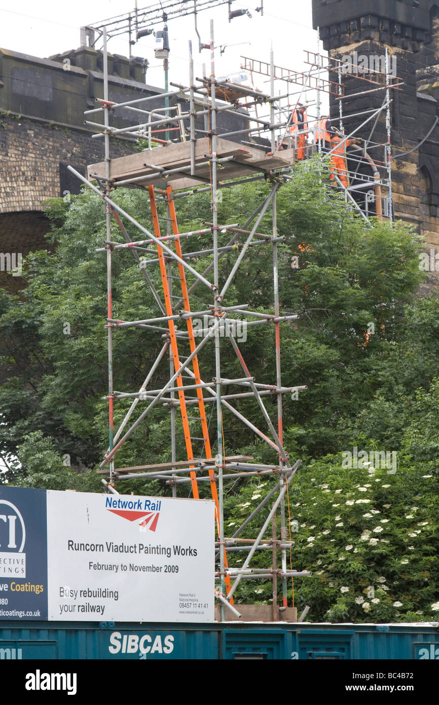 Refurbishment of The Runcorn Railway Bridge crosses the River Mersey at ...