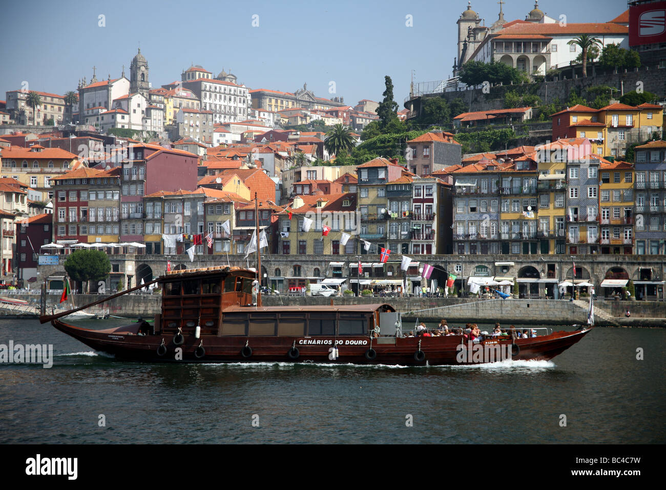 Riverfront Cais da Ribeira Porto Portugal with a wine boat, (Barco ...