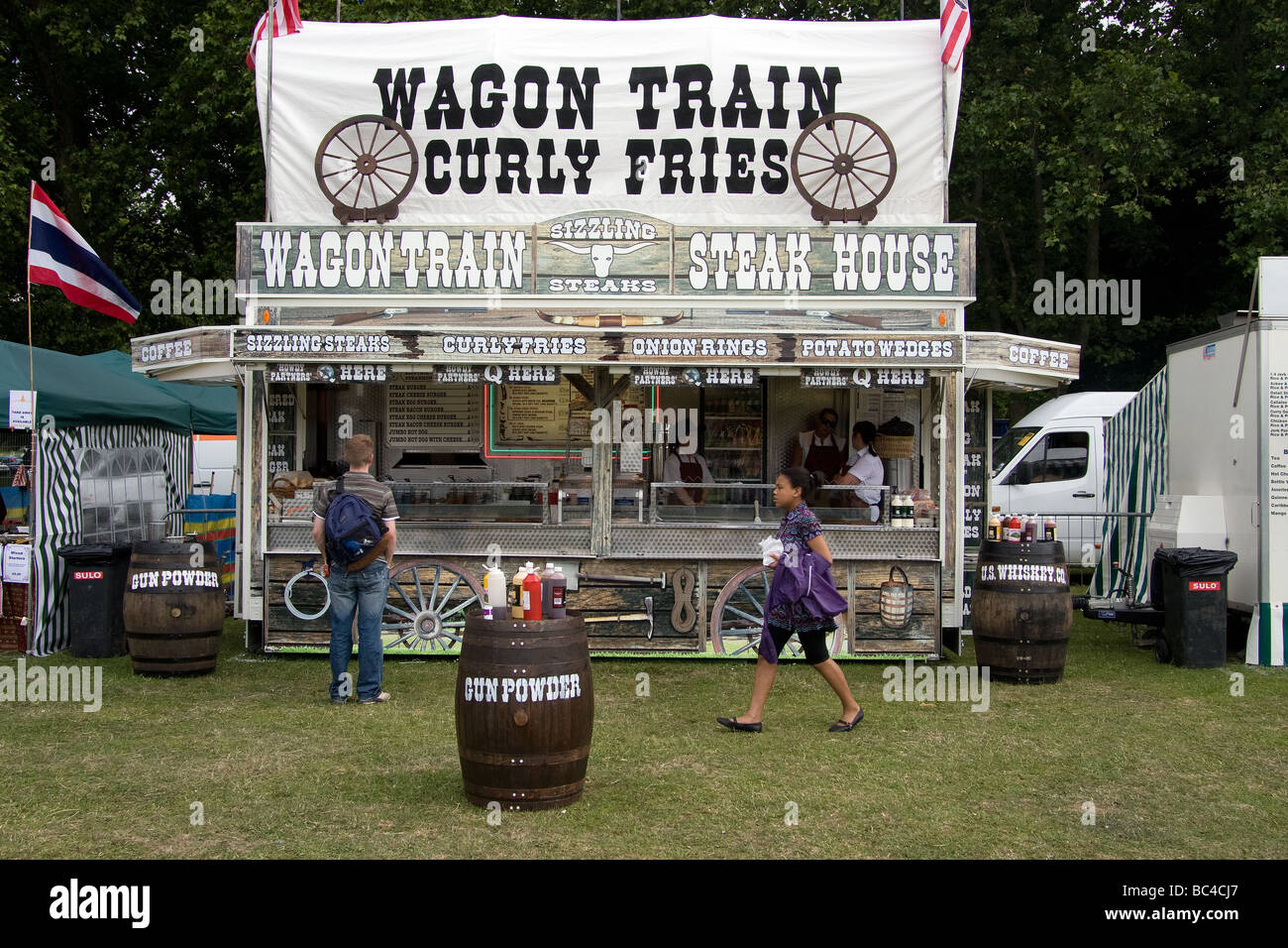 hot fast food joint stall shop customers victoria park bow england UK ...