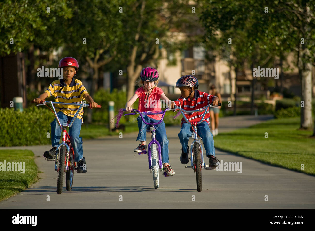 Child children riding bicycles bicycle bikes bike together outsideU ...
